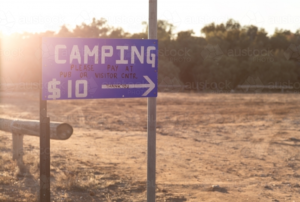 Image of $10 camping sign at campground - Austockphoto