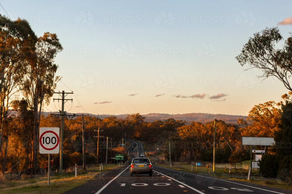 Image of 100 speed zone change on country road in Australia with gum ...