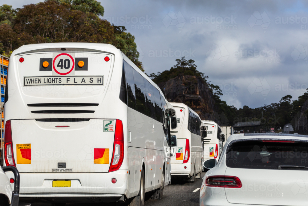 Image of 40 when lights flash sign on back of busses traveling in heavy ...