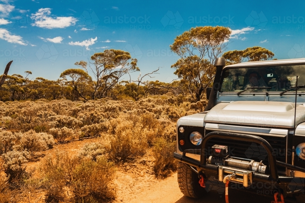 Image of 4x4 truck driving in the outback - Austockphoto