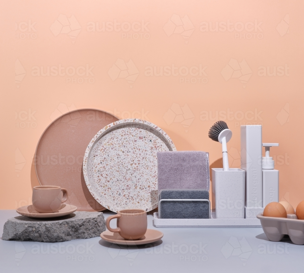 Image of A curated arrangement of household items arranged in an ...