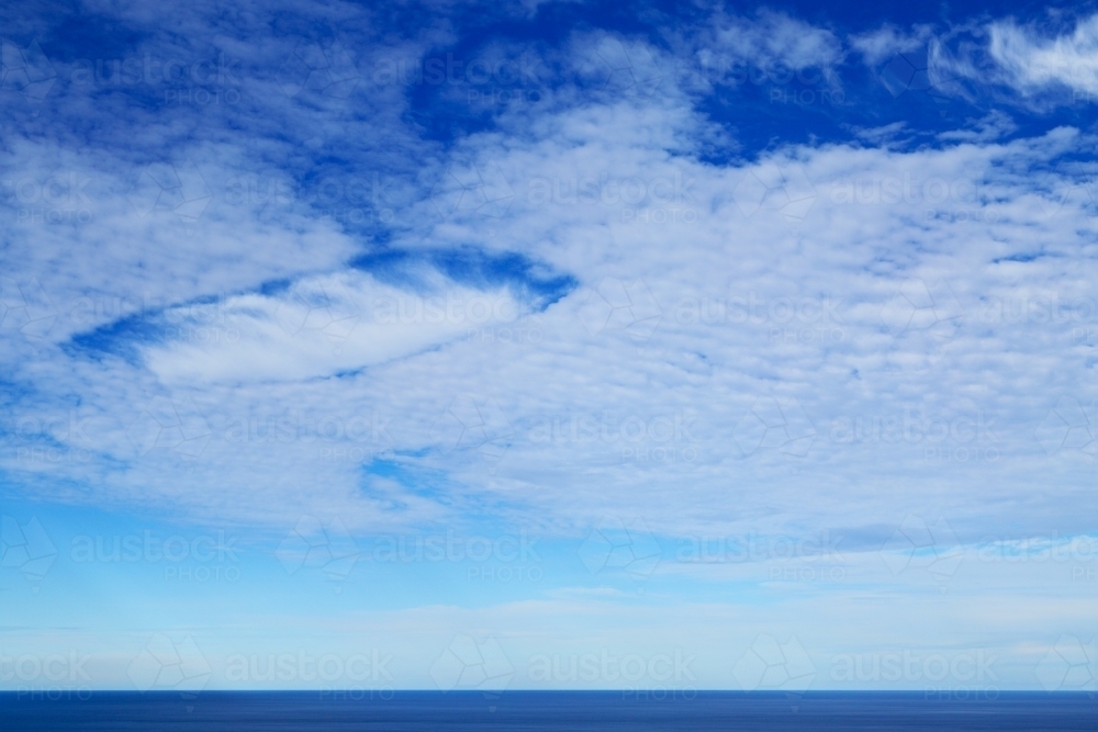 Image of A fallstreak hole, also known as a hole punch cloud, over the ...