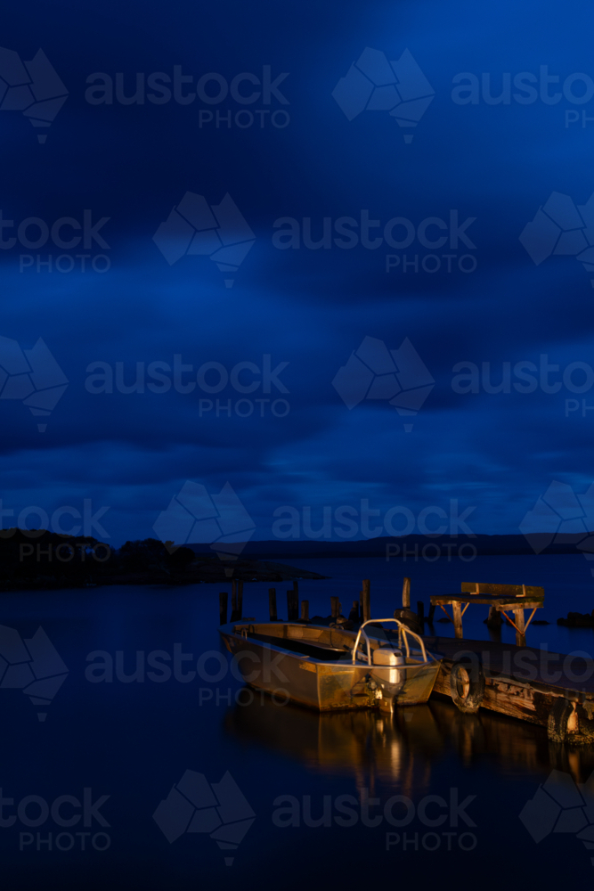 Image of A night photo with light-painting of a recreational fishing ...