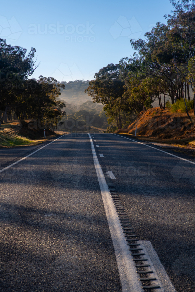 Image of A quiet country road stretches through the Australian ...