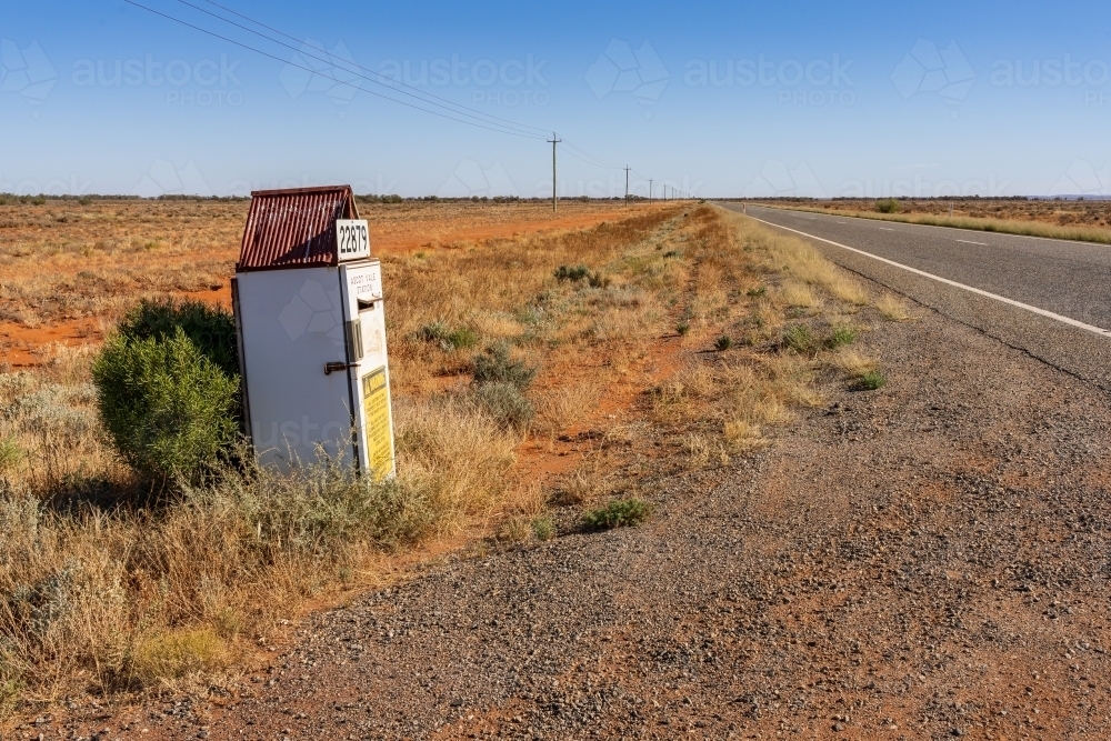 Image of A refrigerator converted into a mailbox on the side of an ...
