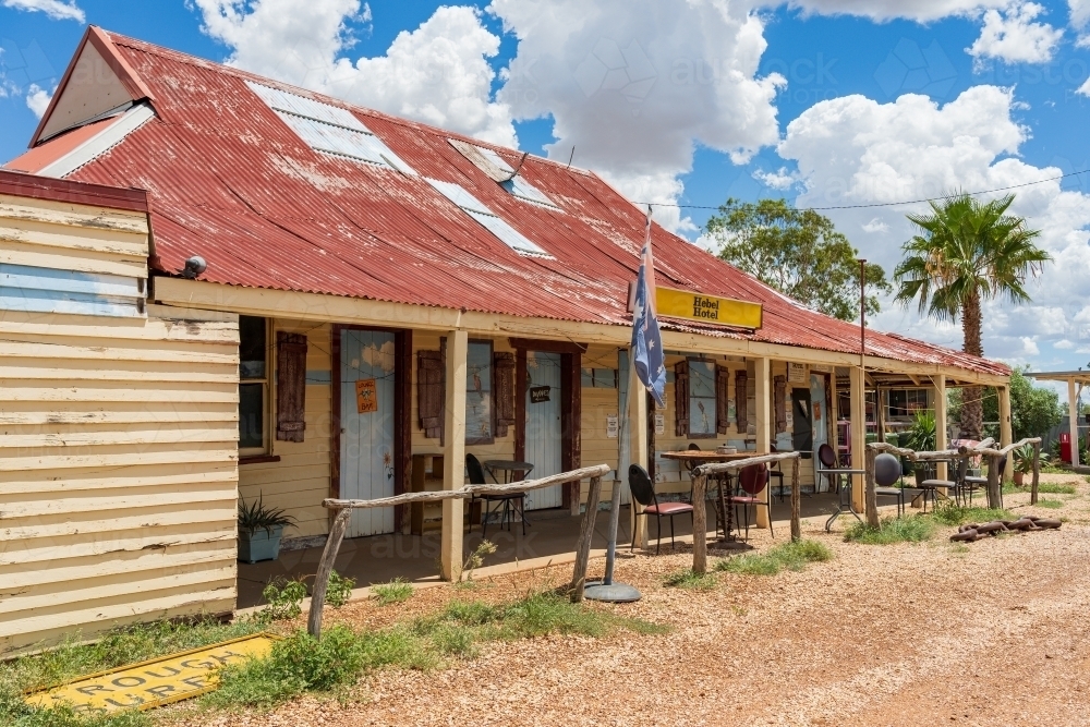 Image of A rustic outback pub with a red tin roof and wide veranda ...