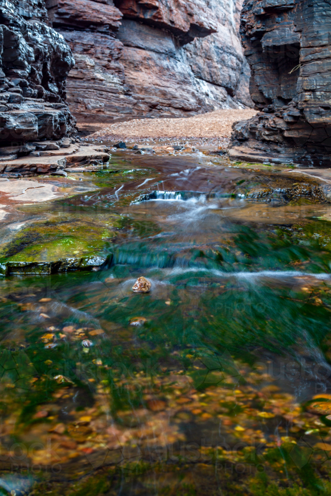 Image of A small stream flowing out of Joffre Gorge - Austockphoto