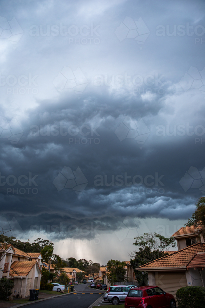 Image of a storm rolling in over townhouses in Brisbane rain incoming ...