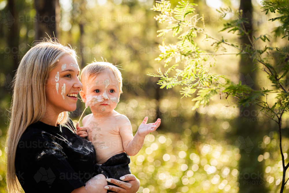 Image of Aboriginal Australian mum and baby with feeding tube enjoying ...