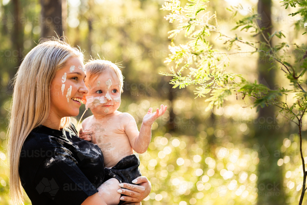 Image of Aboriginal Australian mum and baby with feeding tube enjoying ...