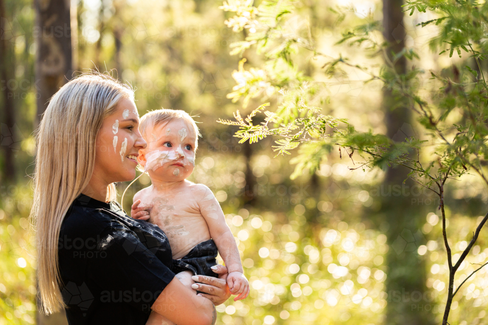 Image of Aboriginal Australian mum and baby with feeding tube enjoying ...