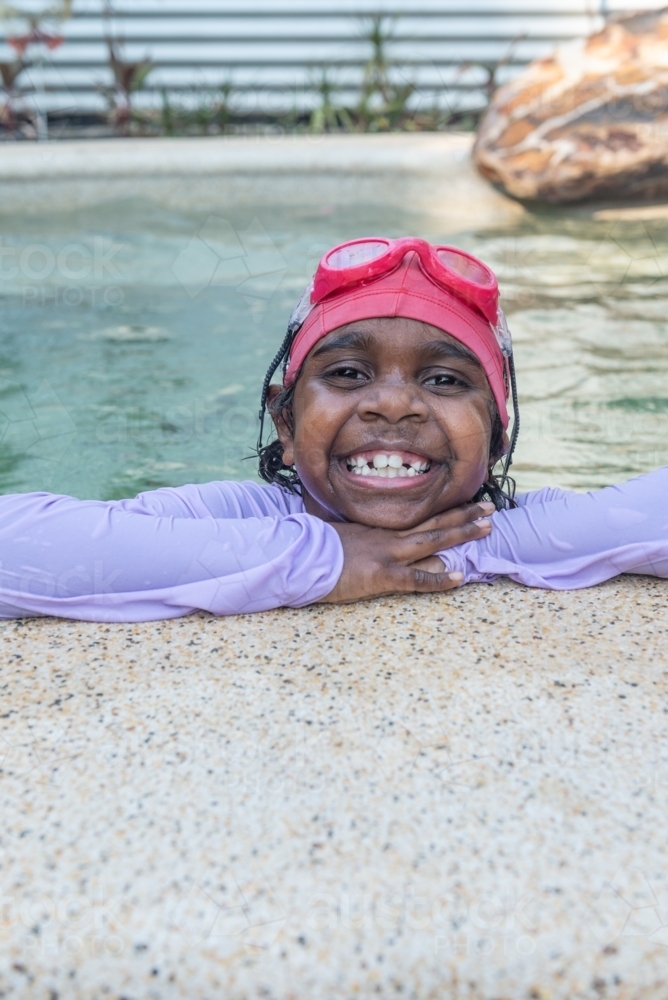 Image of Aboriginal girl in the pool - Austockphoto