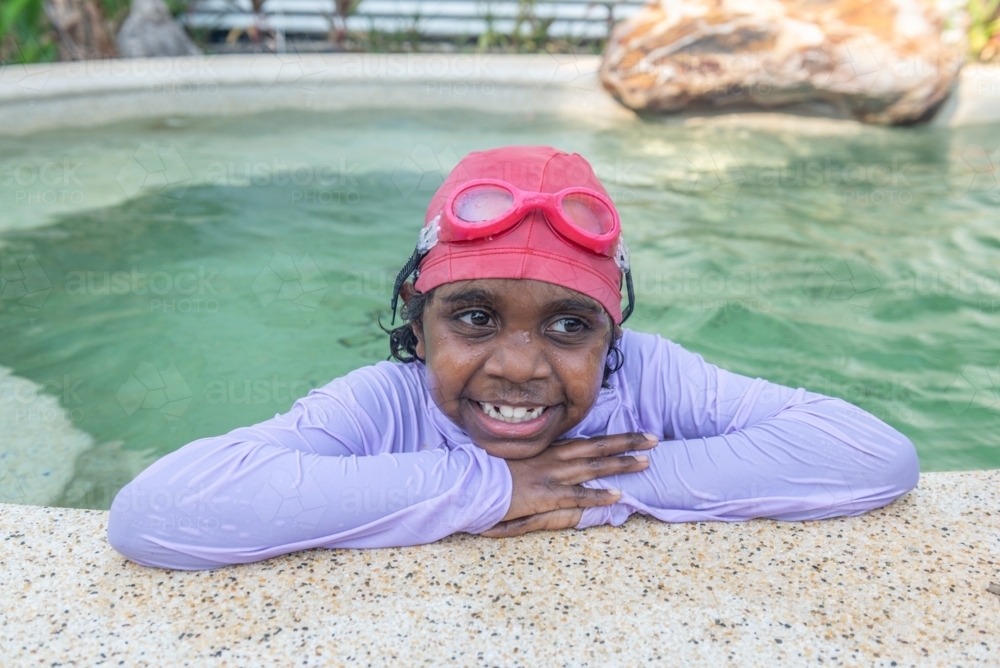 Image of Aboriginal girl in the pool - Austockphoto