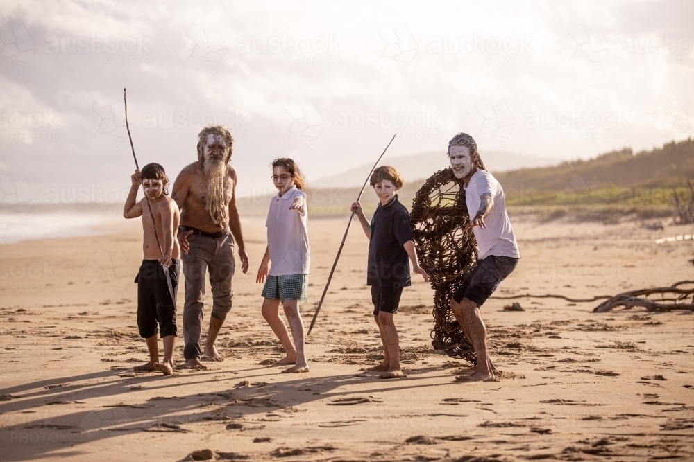 Image of Aboriginal mob at the beach looking at camera elders with ...