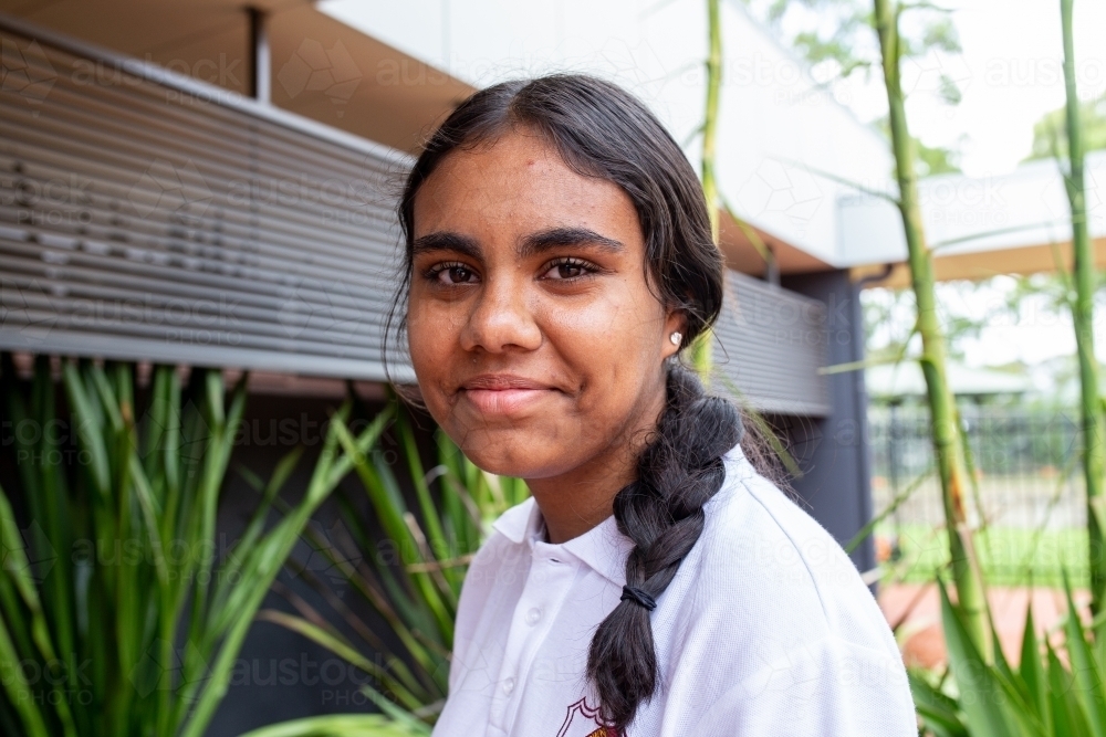 Image of Aboriginal teenage school student looking at the camera ...