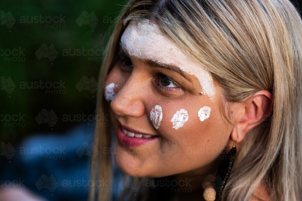 Image of Aboriginal woman looking up in Australian bushland in ...