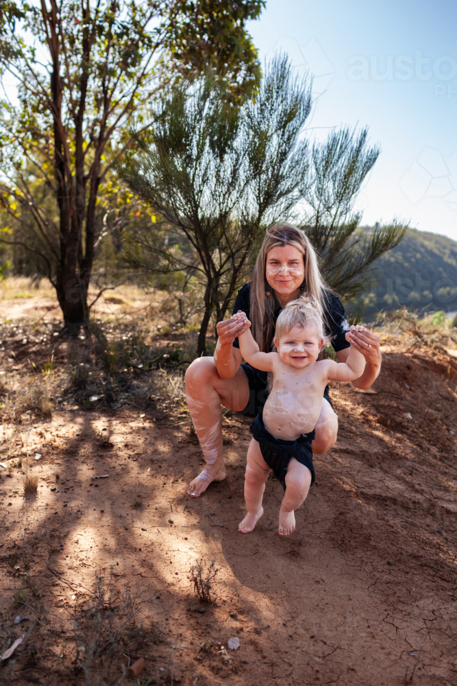 Image of Aboriginal woman with her eight month old baby boy together in ...
