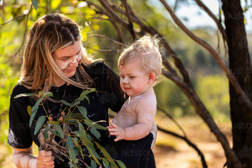 Image of Aboriginal woman with her eight month old baby boy together in ...