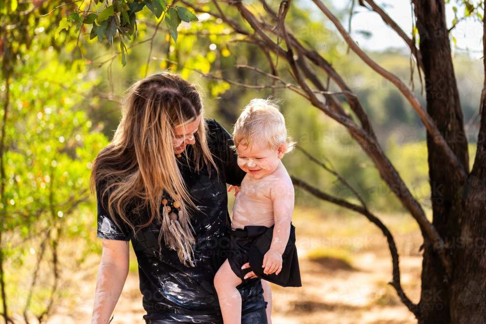Image of Aboriginal woman with her eight month old baby boy together in ...