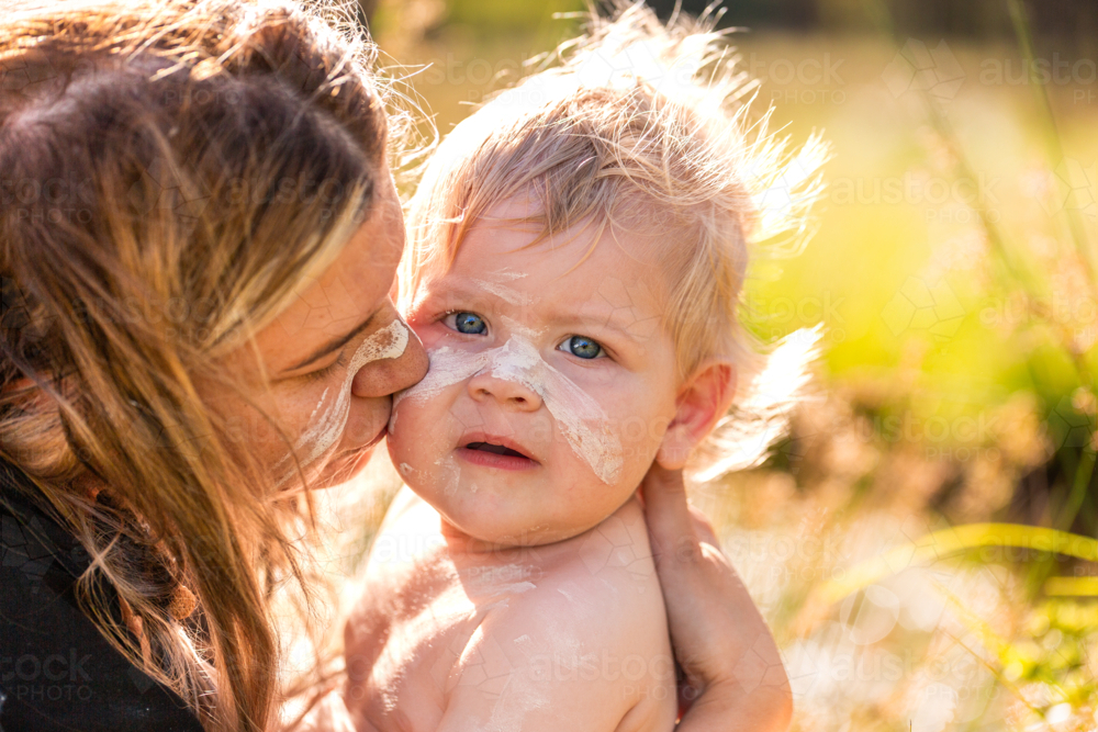 Image of Aboriginal woman with her young child together in Australian ...