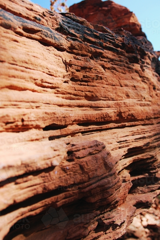 Image of Abstract of red dirt cliff in the outback - Austockphoto