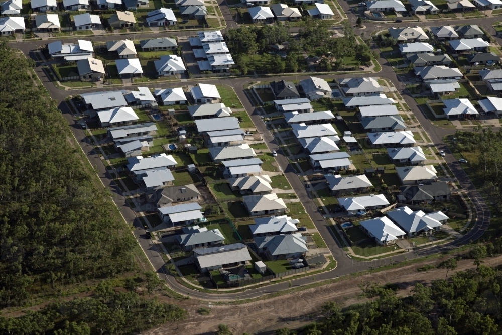Image of Aerial image of new housing development bordering bushland ...