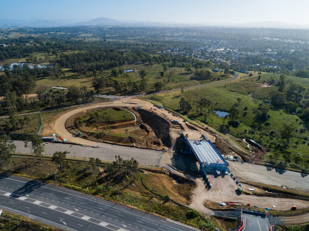 Image of Aerial landscape view of bridge and town bypass infrastructure ...