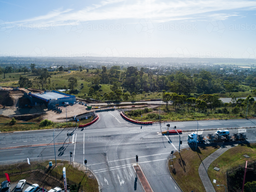 Image of Aerial landscape view of road intersection with bridge and ...