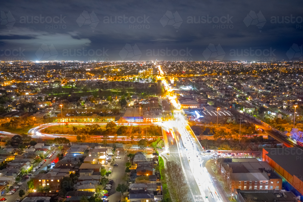 Image of Aerial night time view of city lights on buildings and roads ...