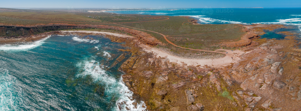 Image of Aerial panorama of a rocky headland with ocean on both sides ...