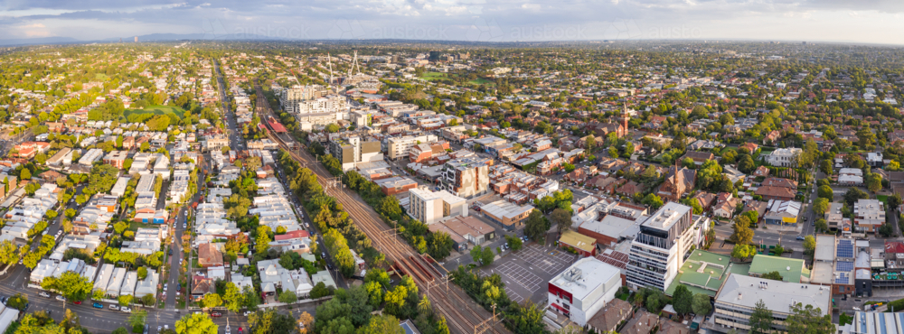 Image of Aerial panorama of buildings of an inner city suburb in golden ...