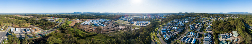 Image of Aerial panorama of new suburb of Huntlee medium-sized township ...