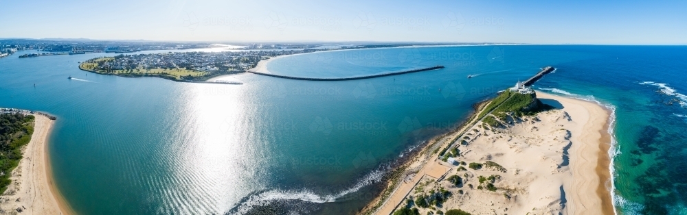 Image of Aerial panorama of Newcastle Harbour on sunlit day where the ...