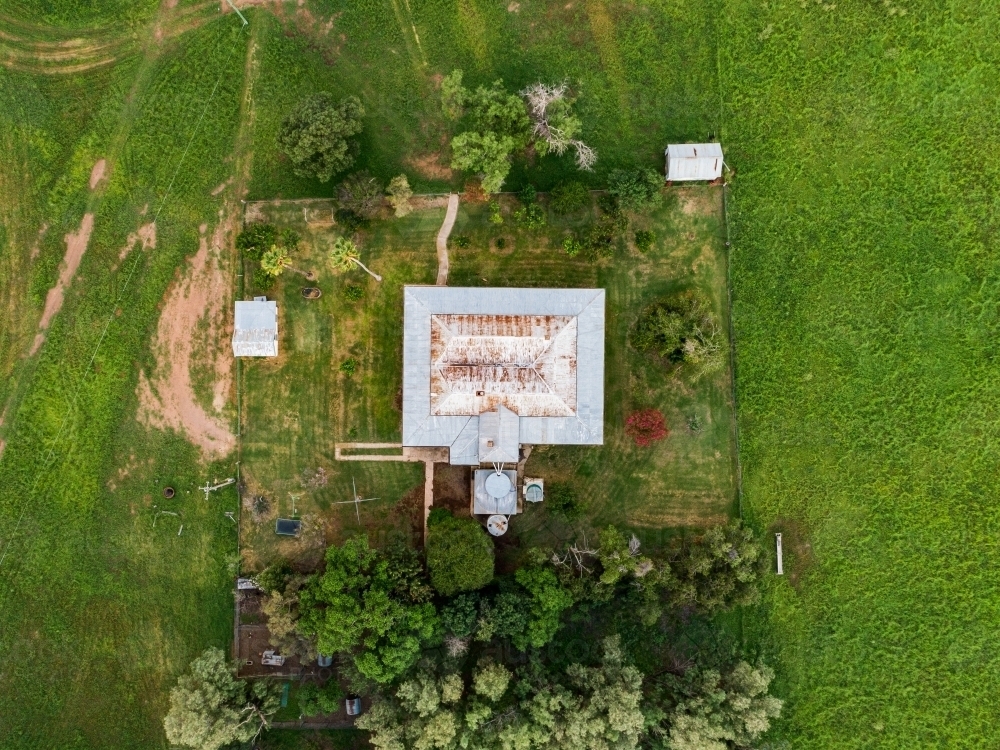 Image of Aerial photo of farm homestead in morning, grass is green ...