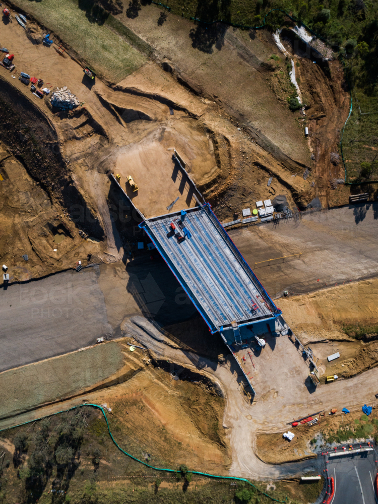 Image of Aerial top down overhead view of bridge and town bypass ...