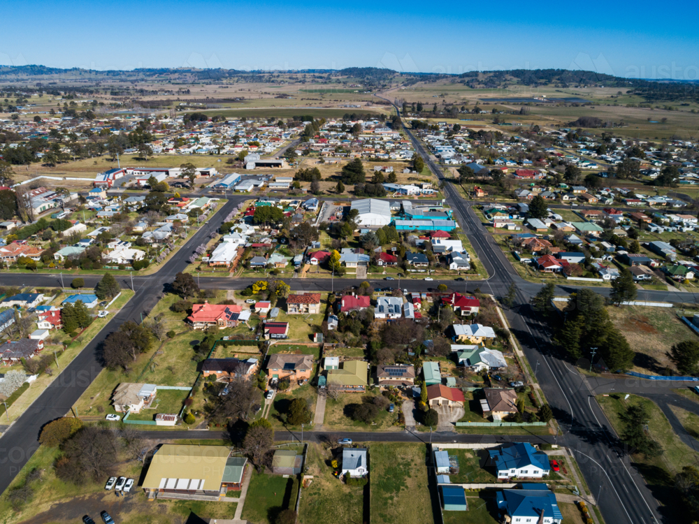 Image of Aerial townscape of small rural town on bright late winter ...