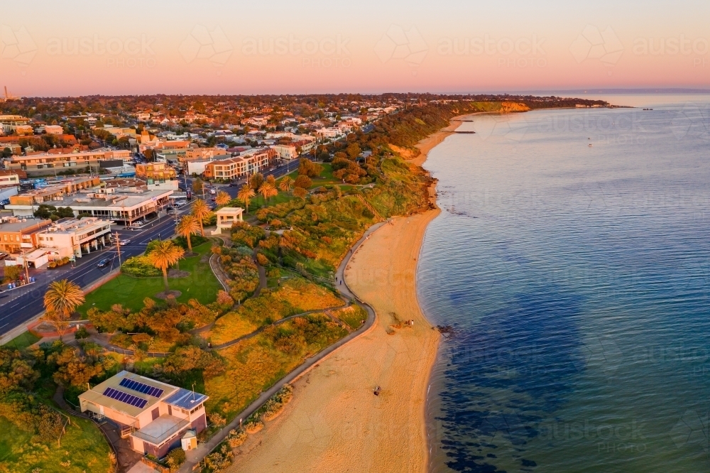 Image of Aerial view a bay side beach with a surf life saving club ...
