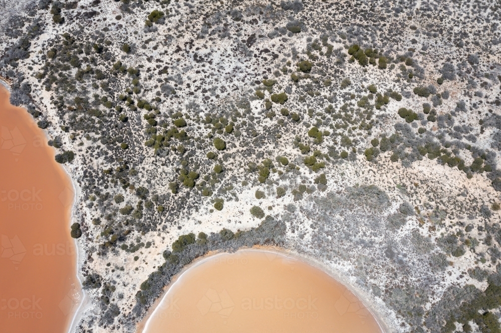 Image of aerial view looking down on two salt lakes and the land in ...
