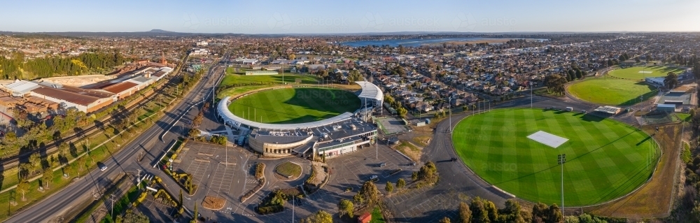 Image of Aerial view of a AFL football stadium with surrounding vacant ...