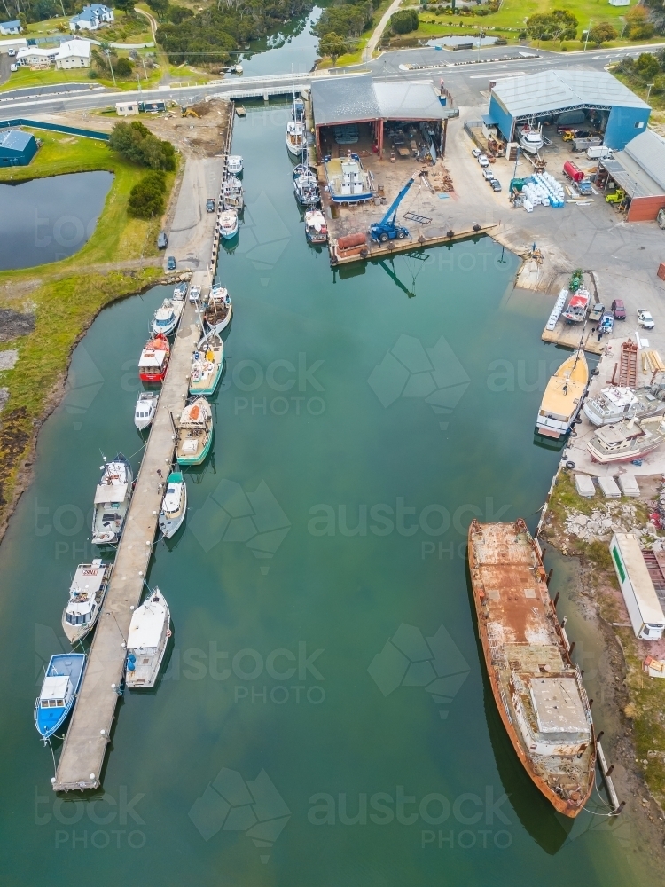 Image of Aerial view of a boat marina and ship yards - Austockphoto