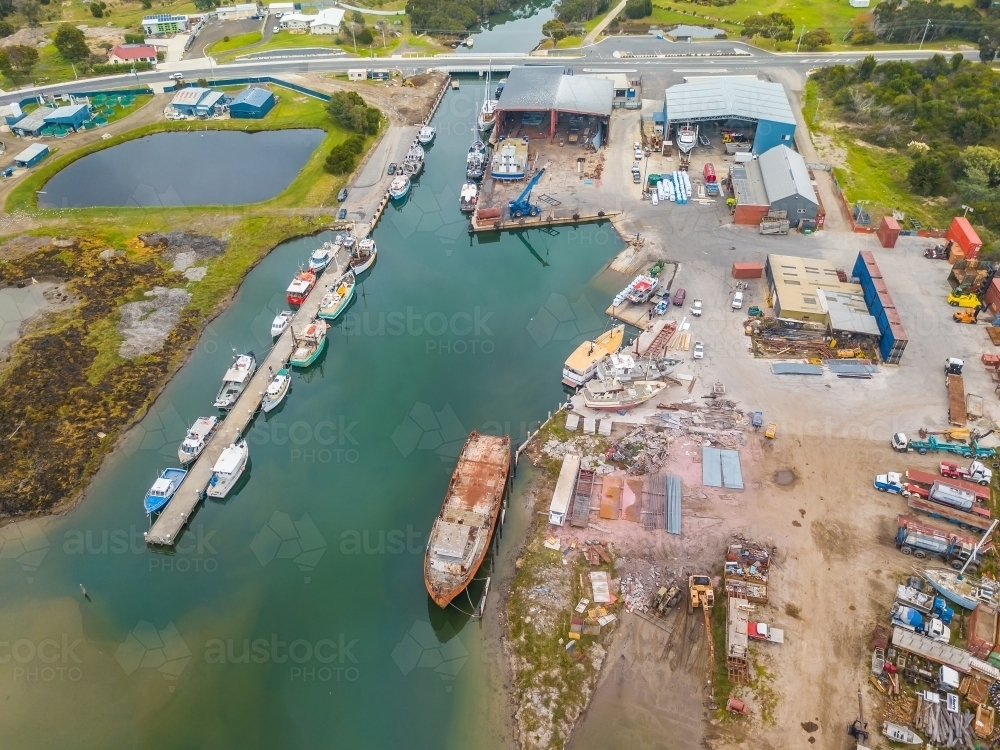 Image of Aerial view of a boat marina and ship yards - Austockphoto
