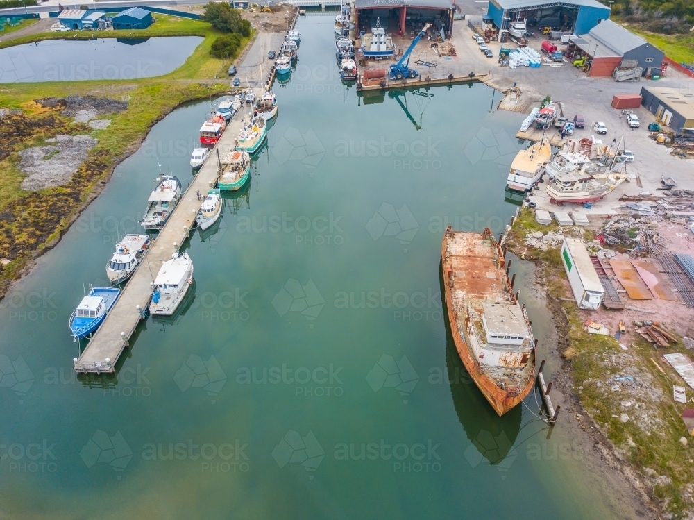 Image of Aerial view of a boat marina and ship yards - Austockphoto