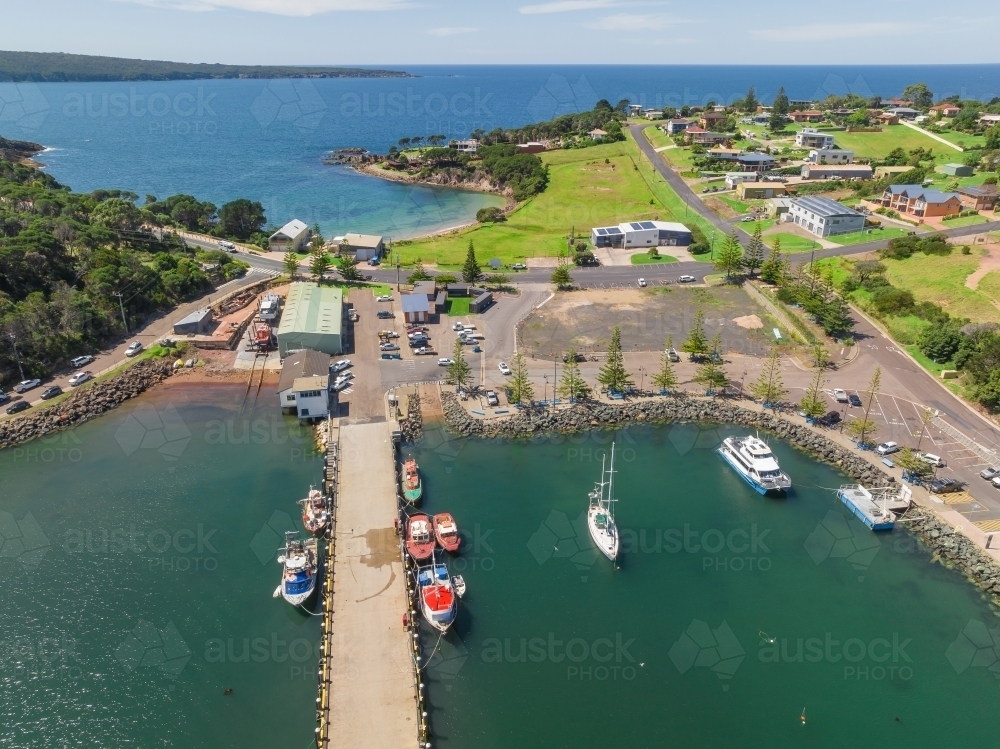 Image of Aerial view of a coastal harbour with boats and yachts moored ...