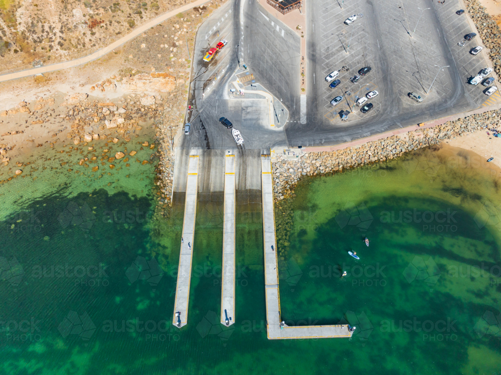 Image of Aerial view of a coastal marina, carpark and boatramp ...