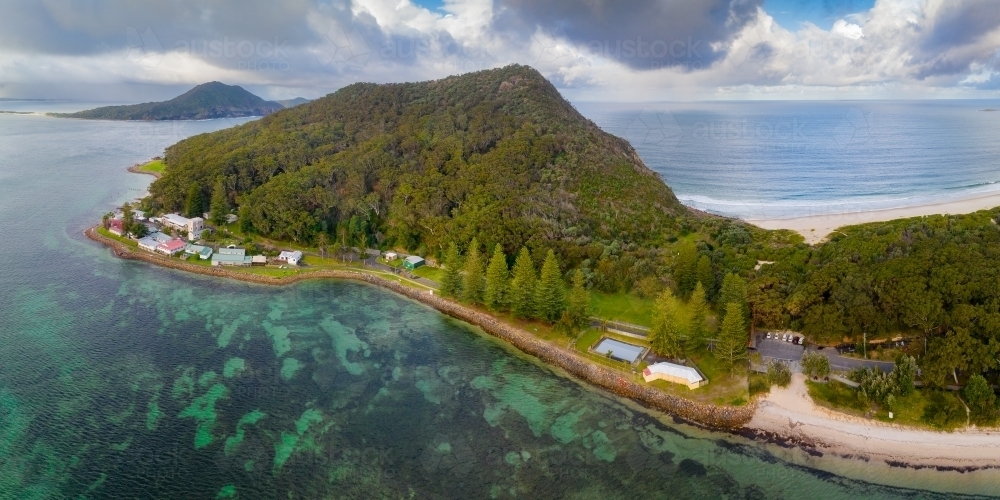 Image of Aerial view of a coastal mountain at the end of a point ...