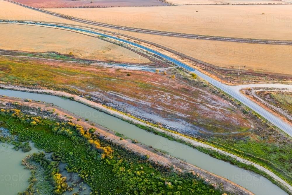 Image of Aerial view of a country road running through farmland and ...