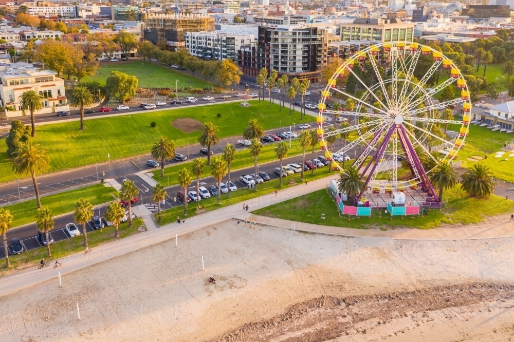 Image of Aerial view of a ferris wheel on a beach reserve - Austockphoto