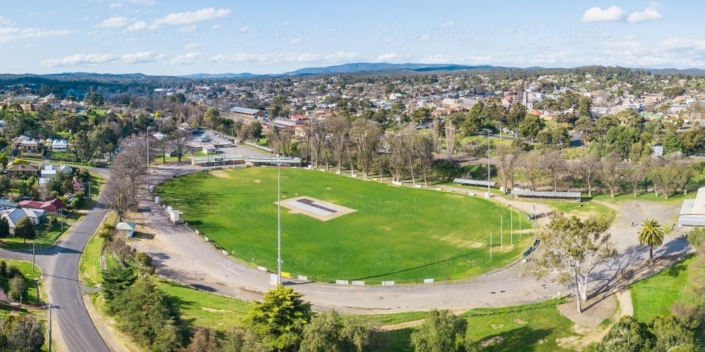 Image of Aerial view of a football oval next to a railway line ...