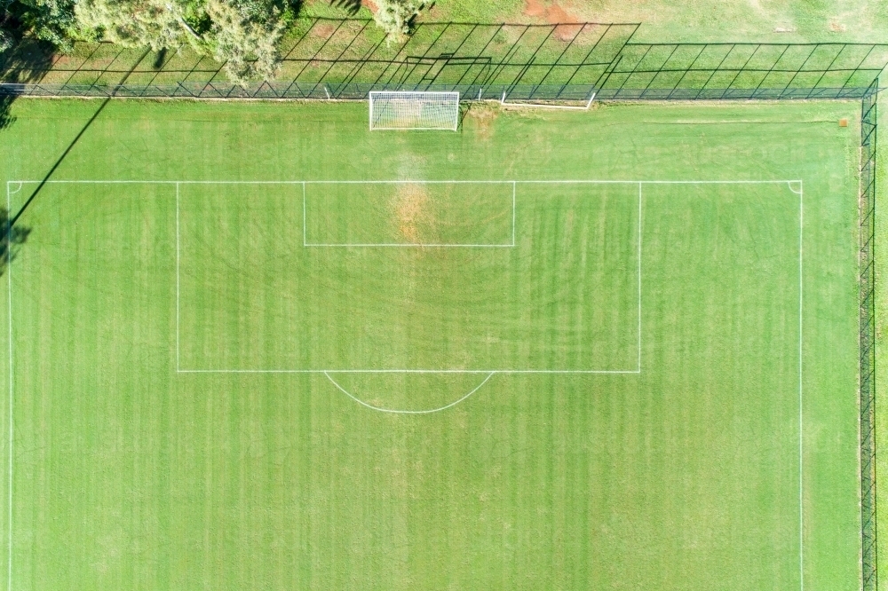 Image of Aerial view of a grassy soccer football field and goals ...