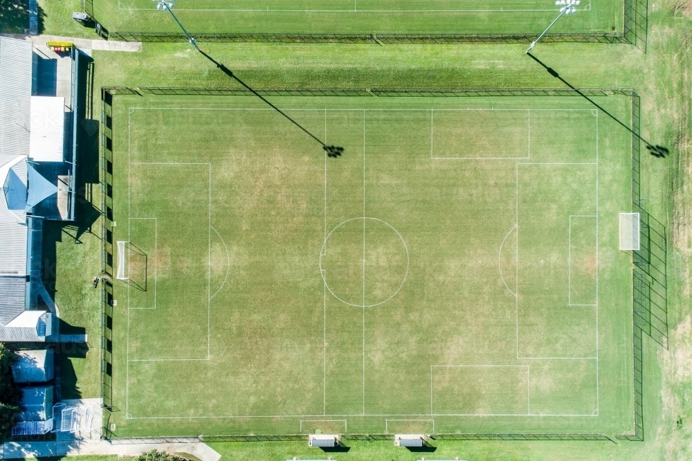 Image of Aerial view of a grassy soccer football field. - Austockphoto